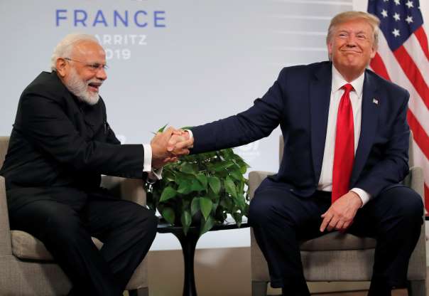 'Howdy, Modi!' - Thousands, plus Trump, rally in Texas for India's ...
